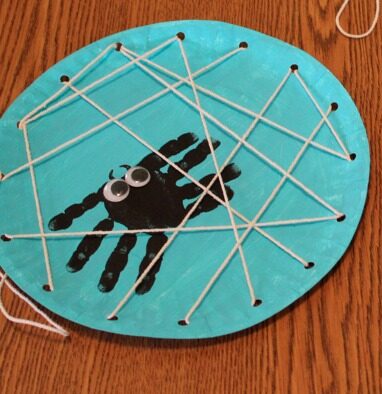 Handprint Spider in a Lacing Card Web | Fun Family Crafts