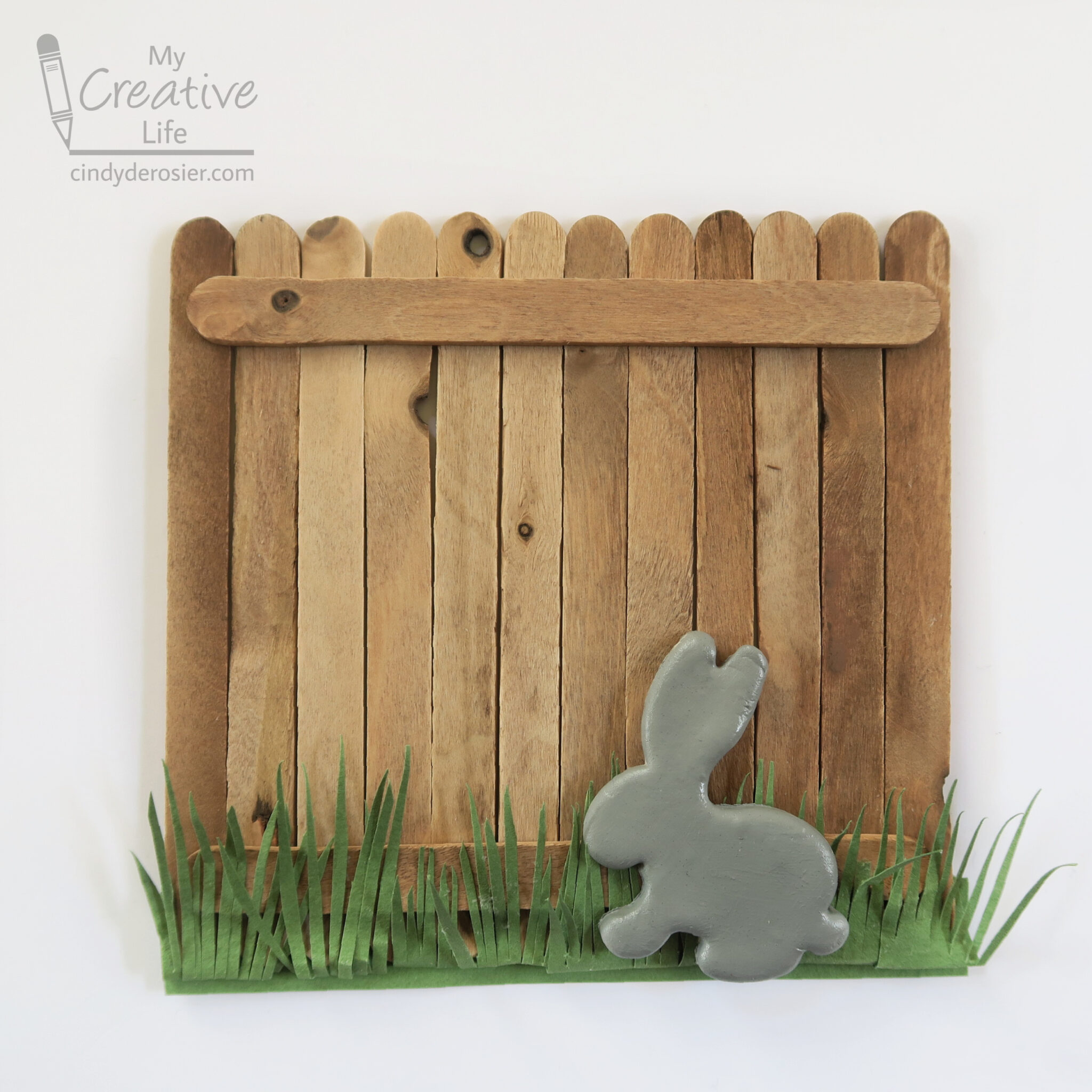 Bunny at the Craft Stick Fence | Fun Family Crafts
