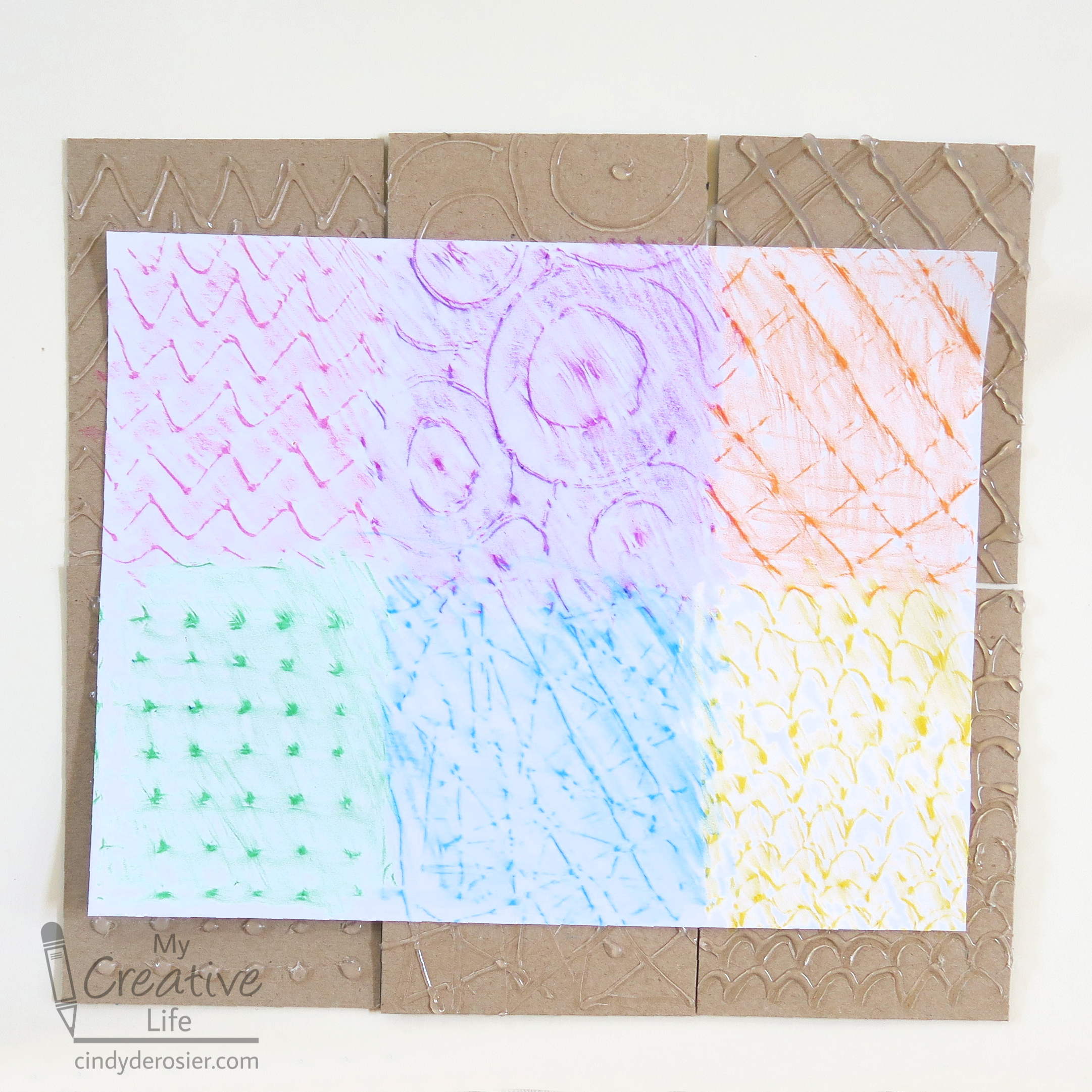 Crayon Rubbings on Homemade Texture Plates | Fun Family Crafts
